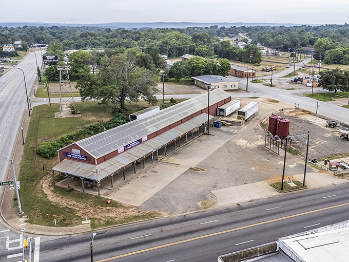 A bird's-eye view of small-town charm. This farmers market pavilion is where neighbors become friends over fresh tomatoes and local gossip.