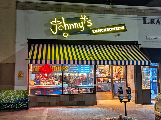 Johnny's bright storefront beckons from the shopping center, hiding breakfast treasures behind striped awnings.
