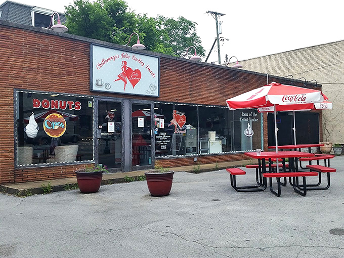 The cheerful storefront promises donuts made with love and served with genuine Southern hospitality.