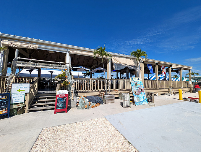 The simple wooden deck and casual vibe at Key Largo Fisheries Backyard Cafe scream "vacation mode activated"&mdash;where seafood tastes better with your toes practically in the water.
