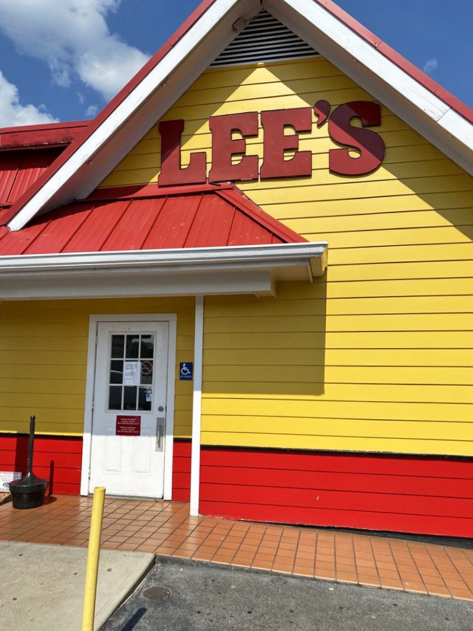 Lee's sunshine-yellow building stands out like a happy chicken beacon on Jasper's horizon.