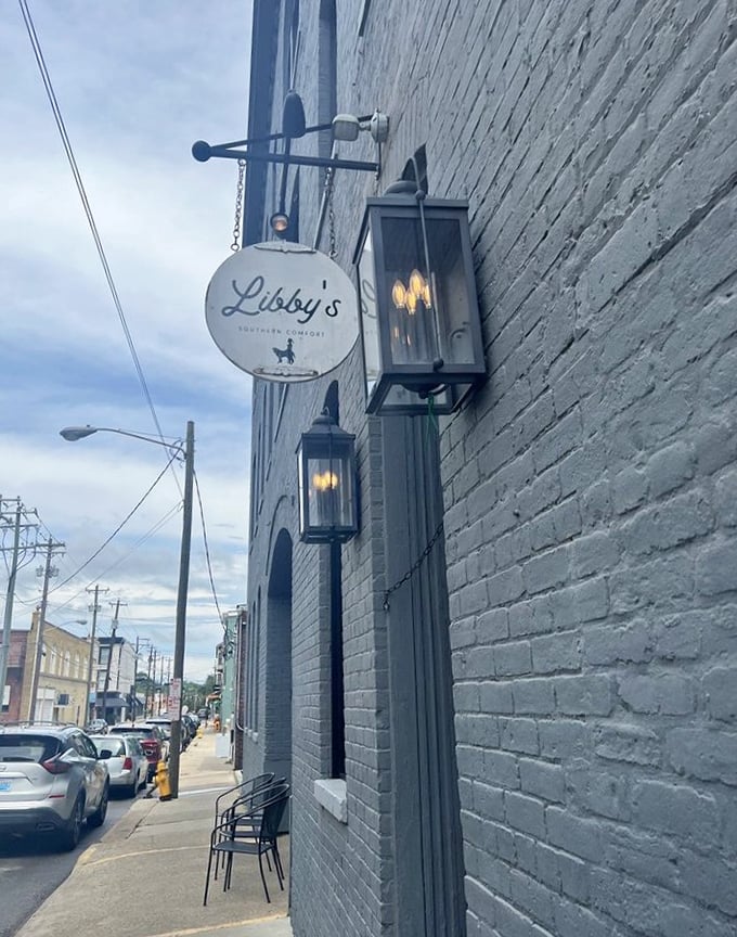 That elegant hanging sign and gas lantern hint at the upscale comfort food waiting inside Libby's brick walls.