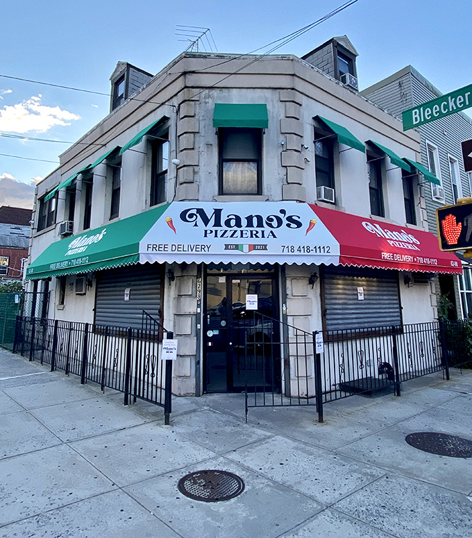 Mano's corner location serves as the neighborhood's pizza compass, pointing toward pure deliciousness always.