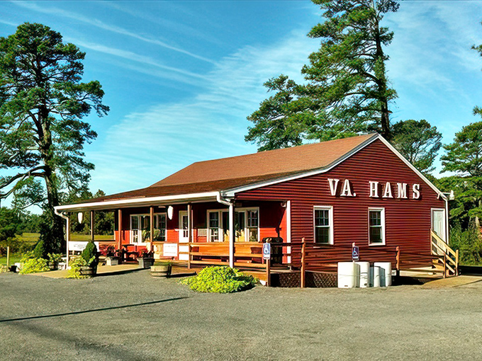 Virginia Hams' rustic red building stands proud against blue skies. This is sandwich country, where tradition meets taste.