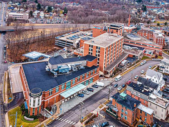 Main Street curves gently past storefronts that welcome shoppers instead of intimidating them with designer attitude.