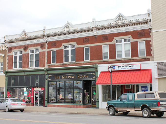 Victorian elegance shines through ornate white trim and red brick in this beautifully preserved downtown building.