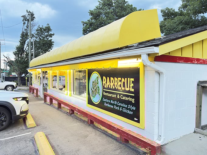 Ole Time Barbecue's bright yellow awning is like a beacon of hope for those seeking authentic Raleigh barbecue.