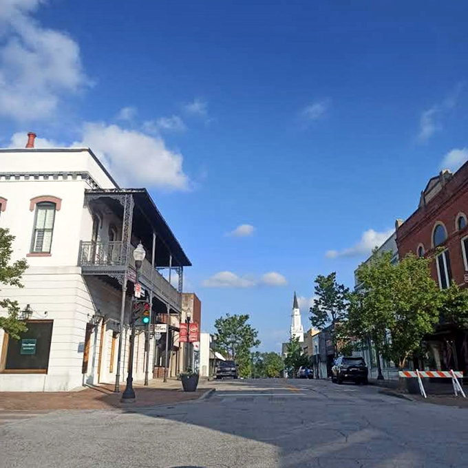 Tree-lined streets create natural canopies over budget-friendly dreams that actually come true here daily.