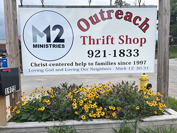 Bright black-eyed Susans welcome visitors to M12 Outreach Thrift Shop, where shopping and ministry blend seamlessly.