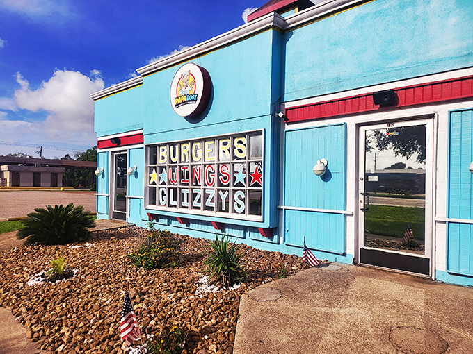 Papa Dogz's cartoon chef mascot promises playful flavors that live up to the vibrant building they're served in.