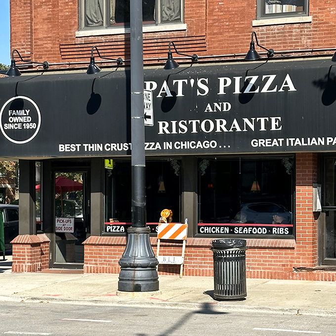 Pat's classic storefront proudly announces its family heritage &ndash; the pizza equivalent of a birth certificate.