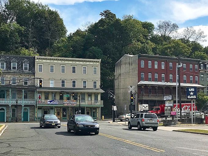 Historic buildings wearing their age like badges of honor, each brick telling tales of American perseverance. 