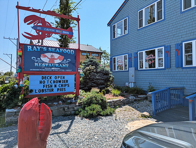 Ray's Seafood's bright blue building and cheerful red lobster sign are like a maritime theme park for your taste buds. No roller coasters, just flavor thrills.