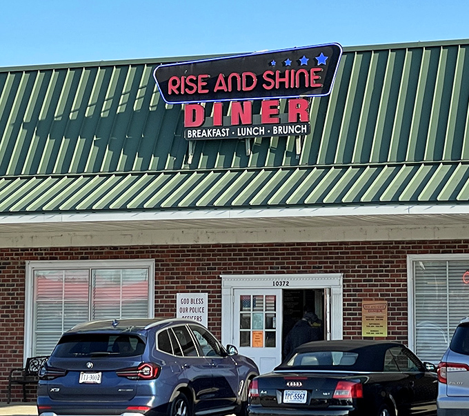 Rise and Shine's green roof catches morning light like a rooster announcing breakfast time. 