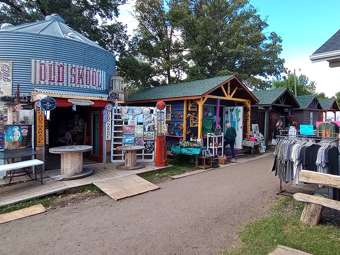 Colorful vendor tents dot the landscape like a festival celebrating everything old, rusty, and absolutely perfect for your yard.
