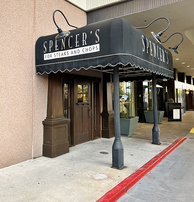 Spencer's classic awning promises old-school steakhouse perfection. The little black dress of beef establishments.