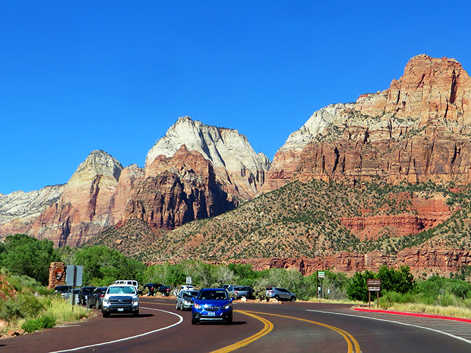 Those towering Zion cliffs make Springdale's main road feel like driving through nature's own cathedral every single day.