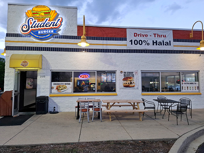 That glowing sign acts like a burger lighthouse, guiding hungry souls to halal heaven.