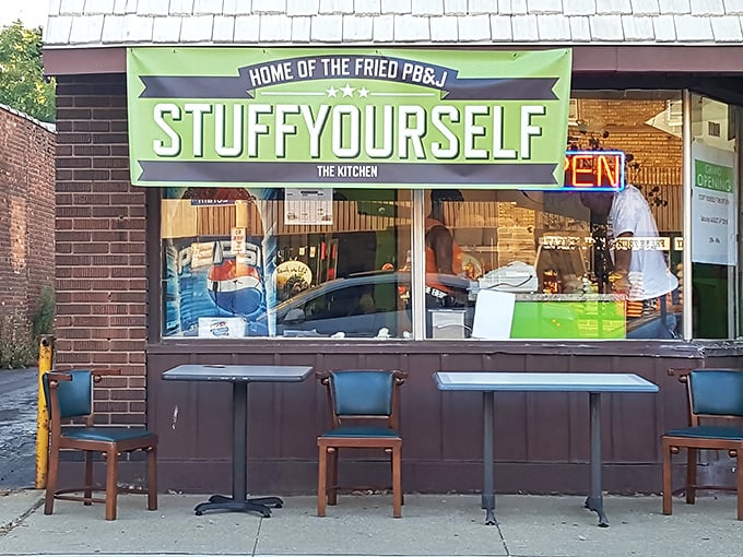 "Stuff Yourself" isn't just a name, it's a mission statement. The green sign promises fried delights that'll test your belt's limits.