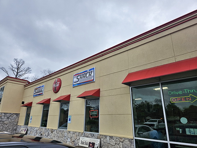 Tacker's Shake Shack (sign): "That towering sign is like a lighthouse guiding shake-seekers safely to creamy, dreamy harbor."
