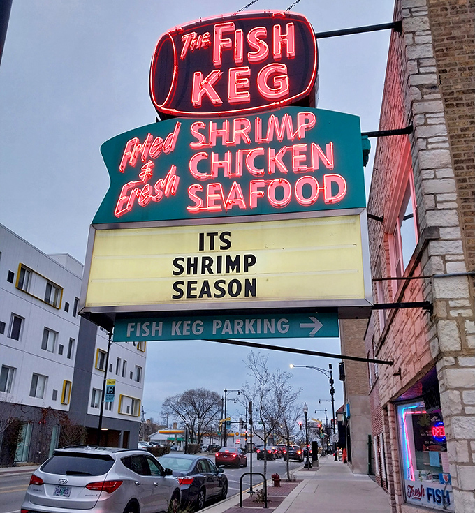That neon sign has guided seafood seekers home for years, glowing like a lighthouse in the urban landscape.