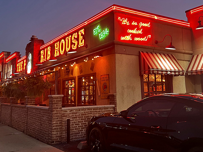 The Pit Rib House's neon glow transforms an ordinary building into a nocturnal barbecue wonderland that beckons hungry night owls.