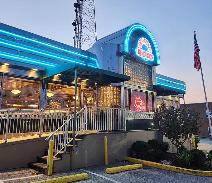 Towson Diner's classic stainless steel exterior shines like the chrome bumper on a vintage Cadillac – American dining at its finest.