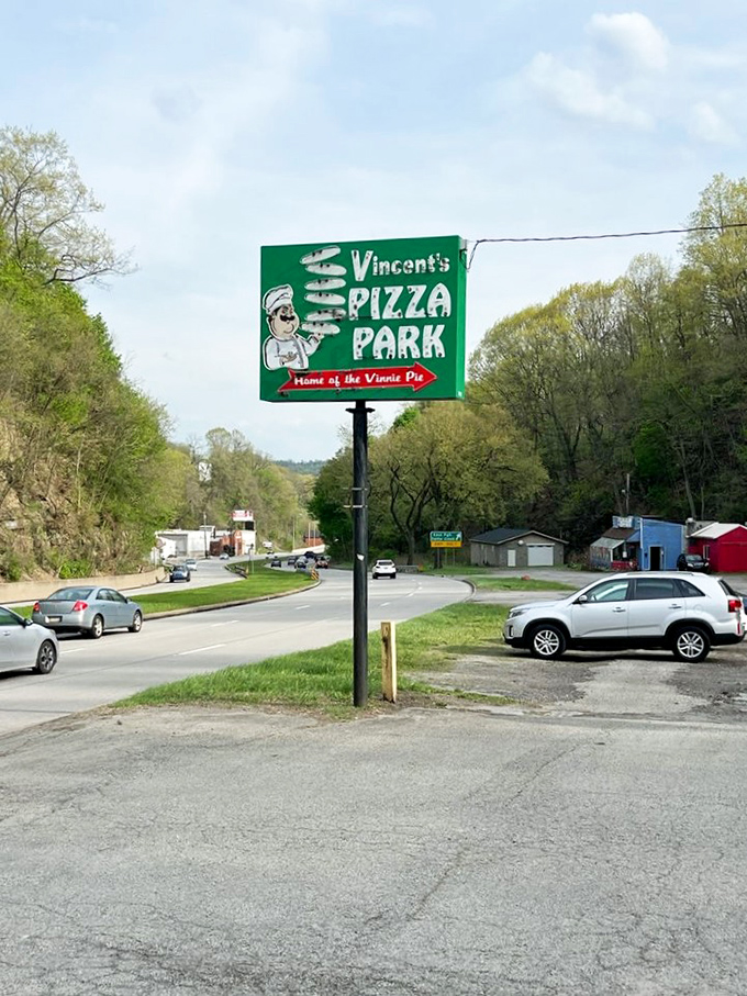 That cheerful green sign promises the kind of pizza park experience that creates lifelong memories.