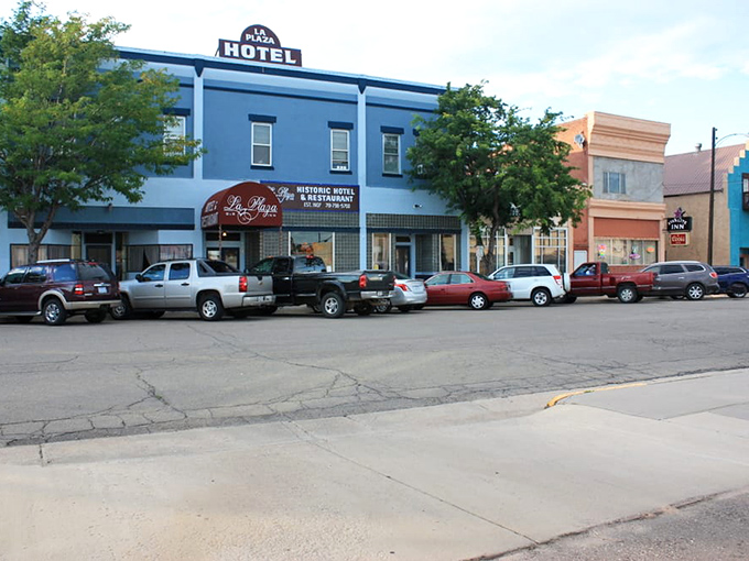 Historic blue hotel stands proudly on Walsenburg's main street, a colorful reminder that affordable small-town charm never goes out of style.