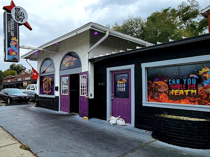 Purple doors and vibrant murals announce that this isn't your grandfather's stuffy barbecue joint experience.