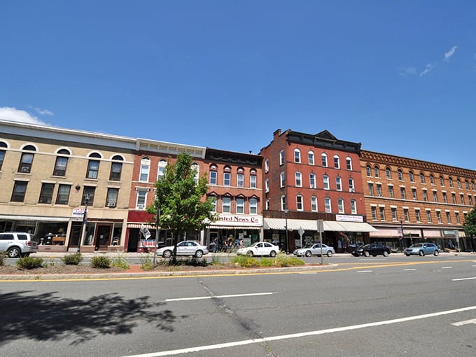 Winsted's downtown stretches along the street like a living timeline of American architectural history.
