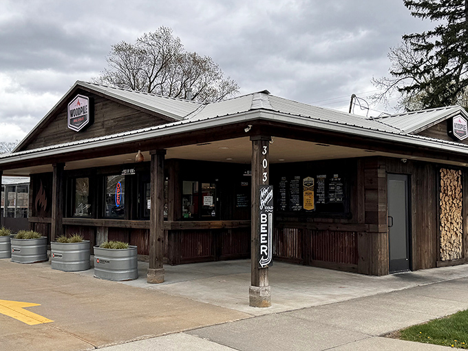 Woodpile BBQ Shack nails that rustic smokehouse aesthetic &ndash; where metal tanks and weathered wood frame smoke-kissed treasures.