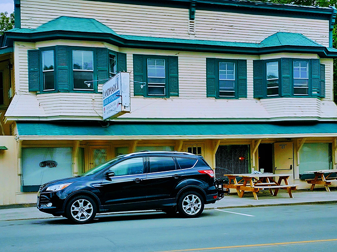 Woodstock's yellow building practically shouts "come in for something delicious" against that perfect blue sky.