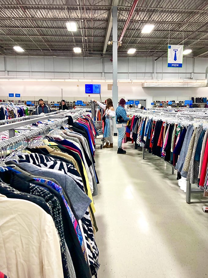 Rows of clothing stretch toward the horizon inside, proving that thrift shopping can absolutely be a superstore experience.
