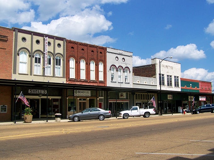 Classic small-town America lives on these covered sidewalks, where the flag waves proudly and flowers bloom because somebody still cares enough to plant them.