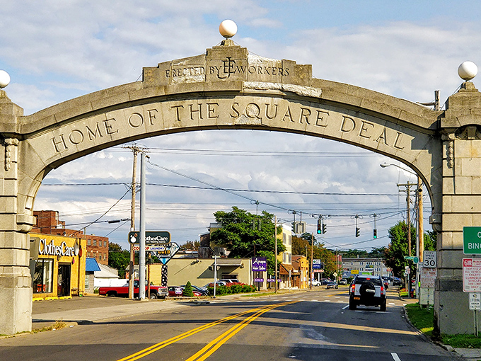 The famous "Home of the Square Deal" arch welcomes visitors to a city proud of its progressive history.