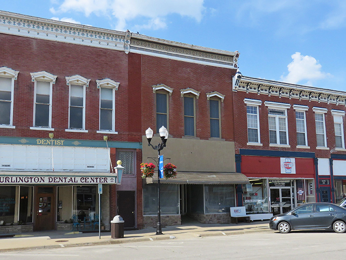 Dental work with a view! Burlington's historic row houses dentists and dreamers alike, where vintage streetlamps bloom with flowers instead of Edison bulbs.