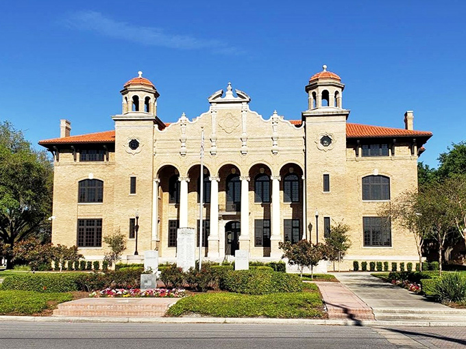 Mediterranean revival architecture meets Florida practicality in this stunning courthouse that anchors community pride perfectly.