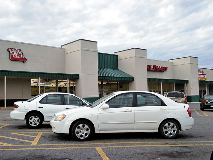 Value Village's parking lot awaits the next wave of bargain hunters. Where empty trunks arrive and full trunks depart!