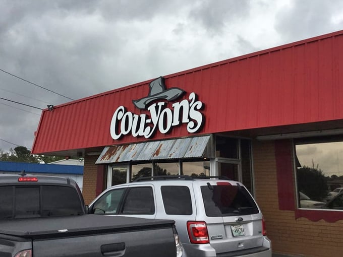 The blue awning adds a pop of color, but it's what's happening inside those smokers that really deserves your attention.