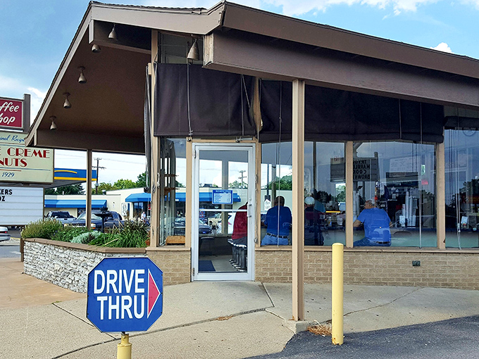 The classic drive-thru window at Crispie Creme has witnessed countless morning commuters finding their happy place before work.
