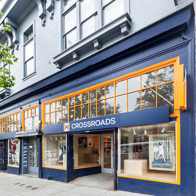 Those golden-framed windows display carefully curated fashion finds&mdash;thrifting with a touch of luxury.