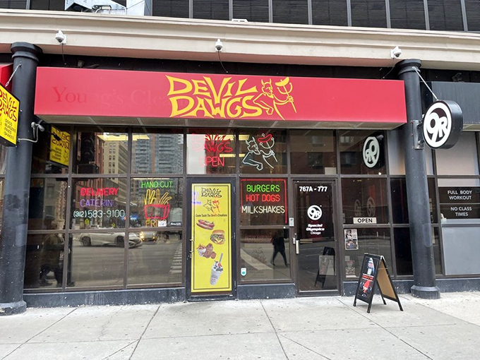 The neon "OPEN" sign in the window is like a beacon for late-night cravings that only a perfect Chicago dog can satisfy.