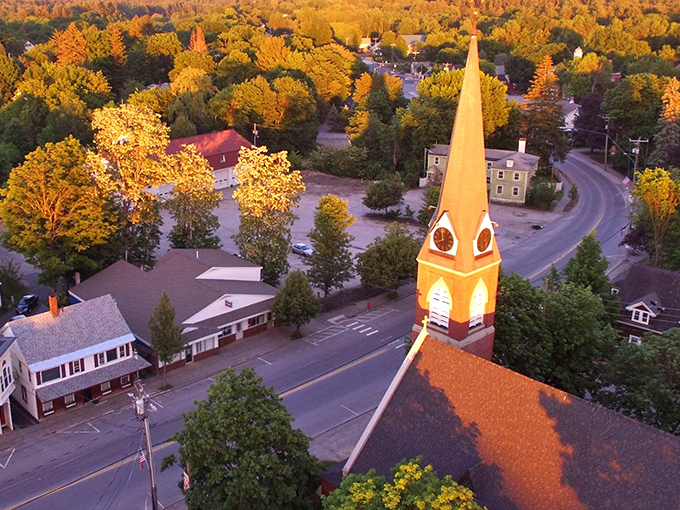 Fall foliage frames Farmington's church steeple, highlighting a town where natural beauty comes free and everyday necessities remain affordable.