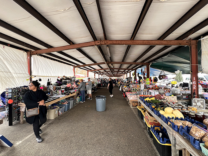Long rows of vendors at Menge create an indoor marketplace buzzing with Gulf Coast bargain hunters.