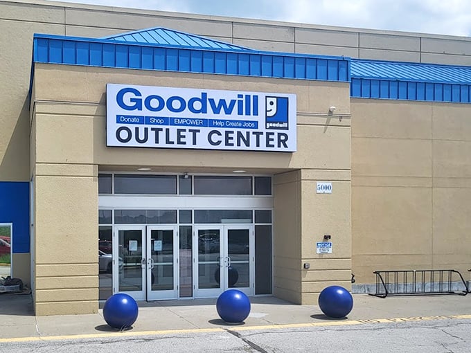 Those blue bollards guard the entrance to thrifting's final frontier - pound-by-pound paradise! 
