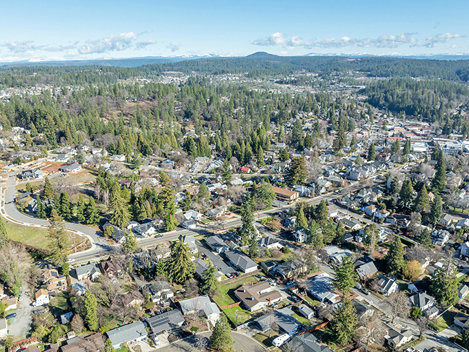 Homes nestle among the trees in Grass Valley's neighborhoods. Where your biggest decision might be which hiking trail to explore today.
