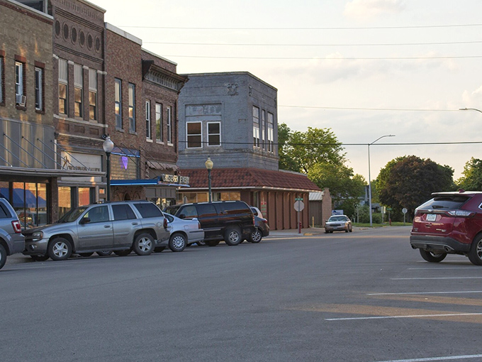 Classic Main Street architecture frames modern life where past and present shake hands every single day.