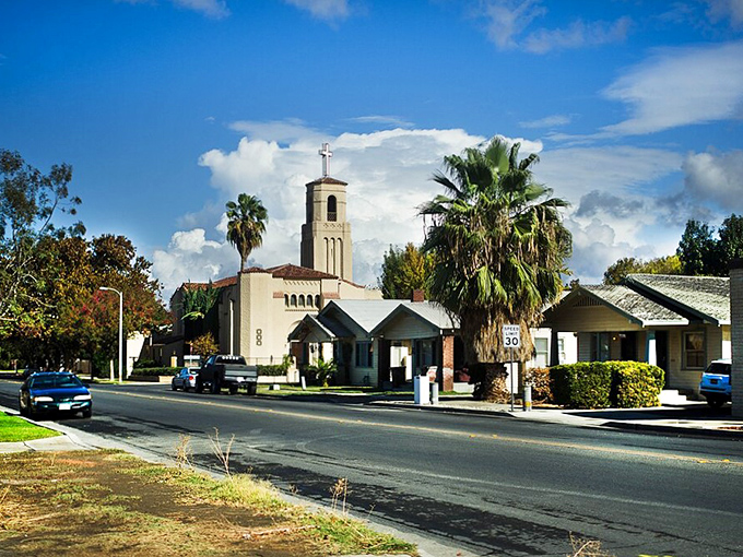 Tree-lined streets invite leisurely strolls through neighborhoods where porches still matter and neighbors actually wave hello.