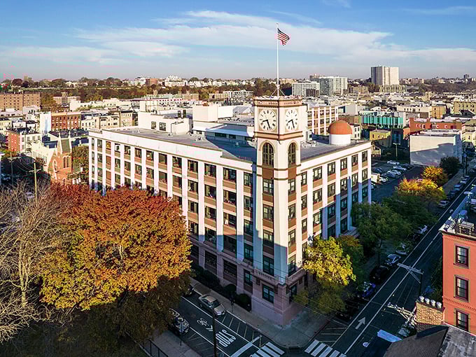 The clock tower stands sentinel over Hoboken, where savvy seniors find big-city amenities without Manhattan's retirement-crushing prices.